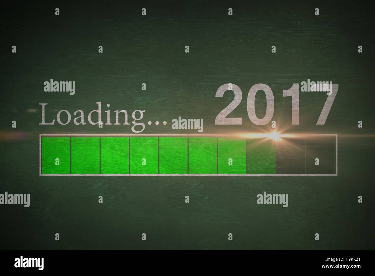 Composite image of green loading display Stock Photo - Alamy