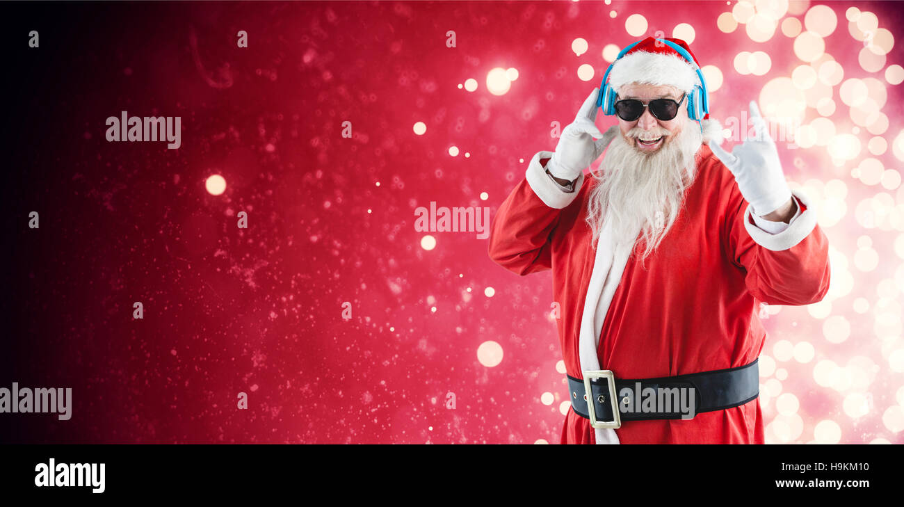 Composite image of cheerful santa claus showing hand sign while ...