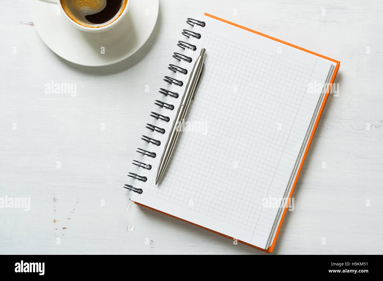 Coffee with notepad and pen Stock Photo - Alamy