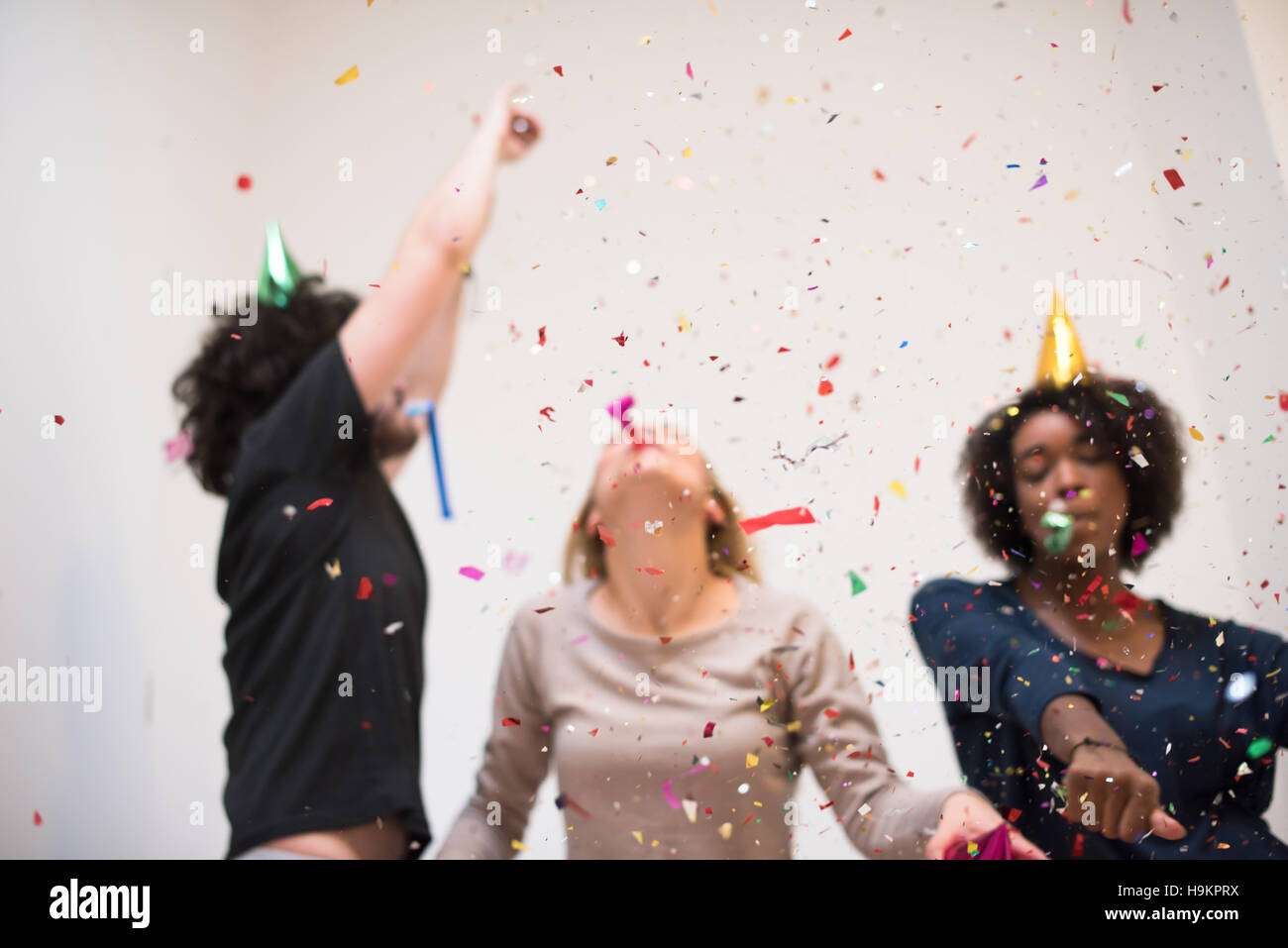 confetti party happy young people group celebrating new year eve while ...