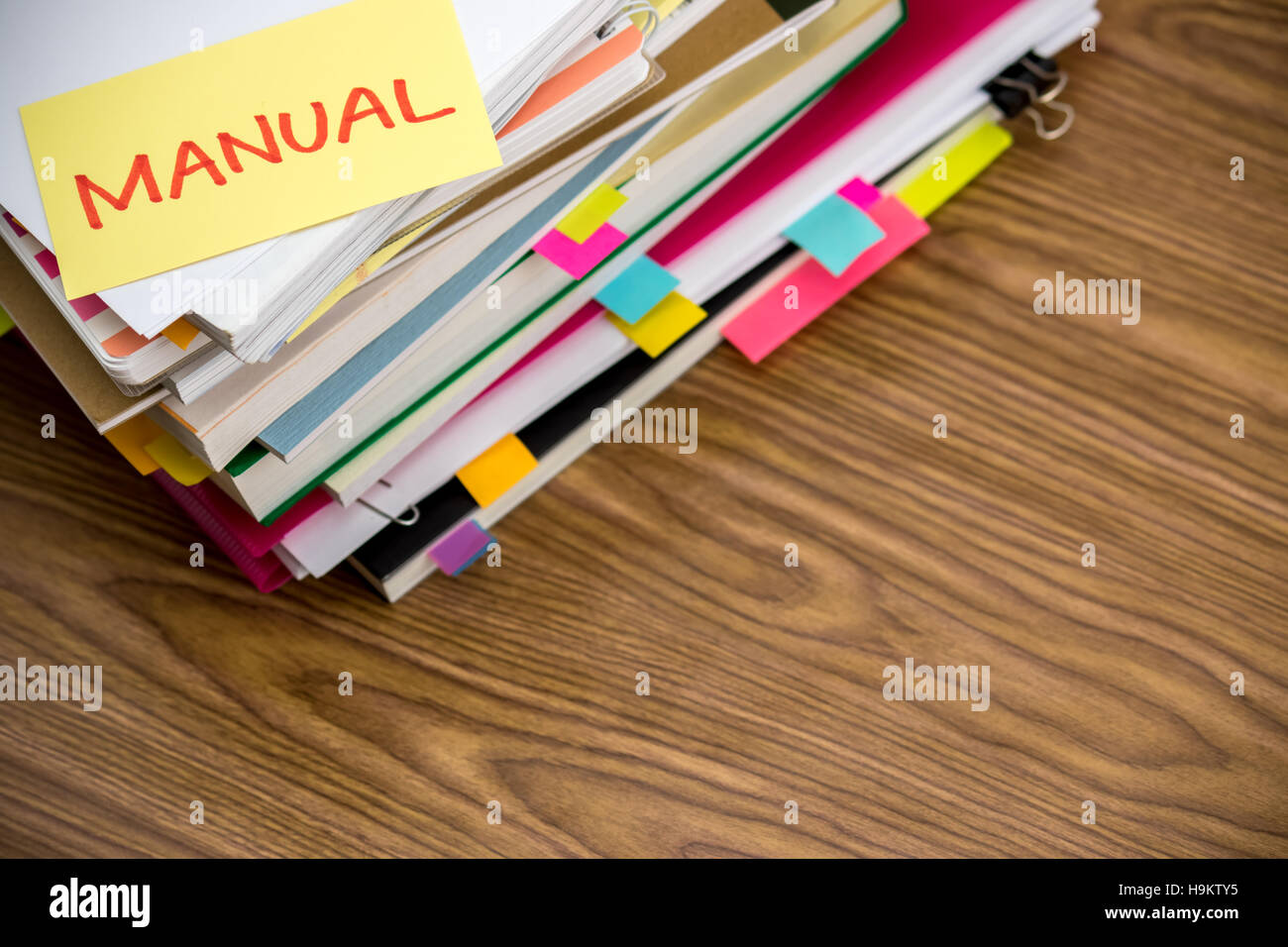 Manual; The Pile of Business Documents on the Desk Stock Photo - Alamy