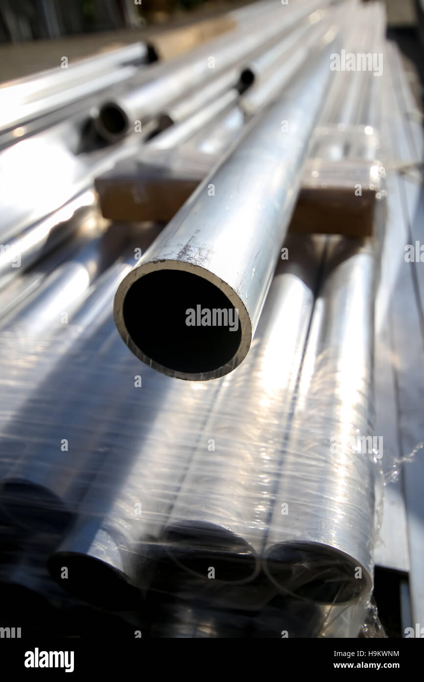 Stack of Many Pipes at the Construction Site Stock Photo - Alamy