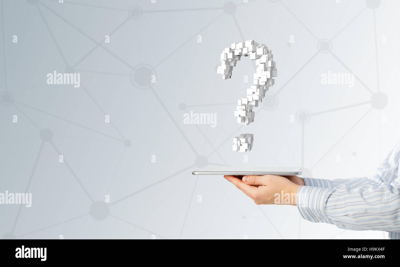 Question mark on tablet screen Stock Photo - Alamy