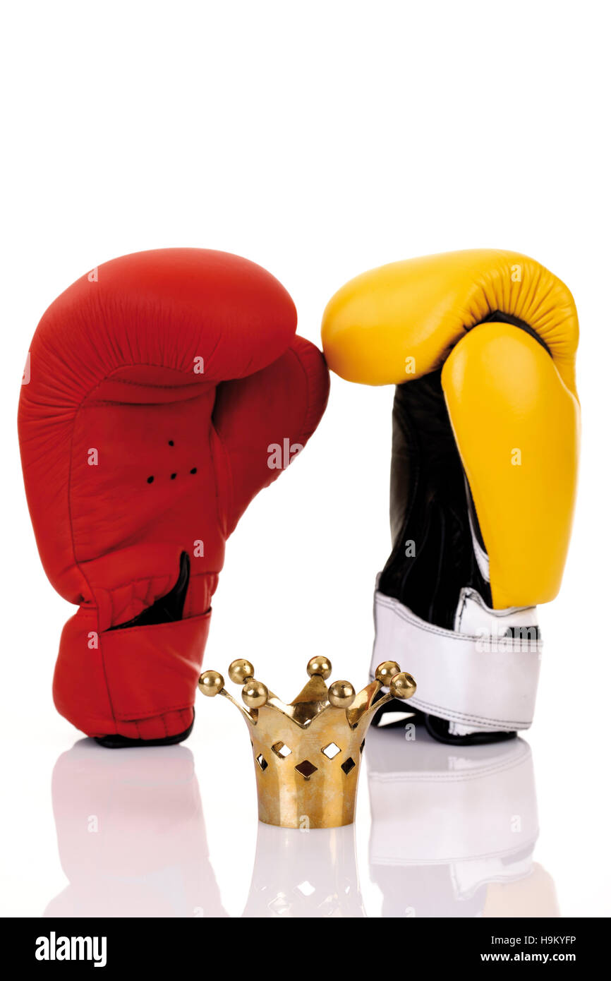 Red and yellow boxing glove and a golden crown Stock Photo - Alamy