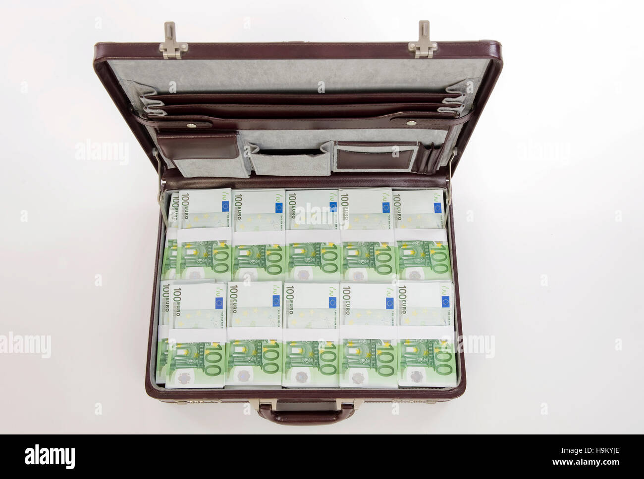 Briefcase full of banknotes Stock Photo - Alamy