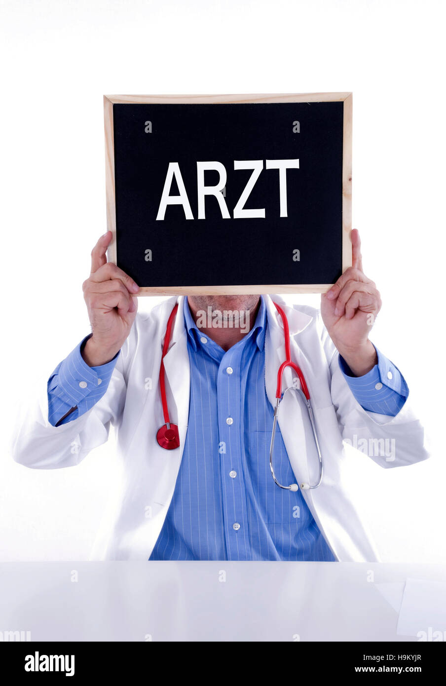 Doctor with blackboard "Arzt", German for "doctor Stock Photo - Alamy