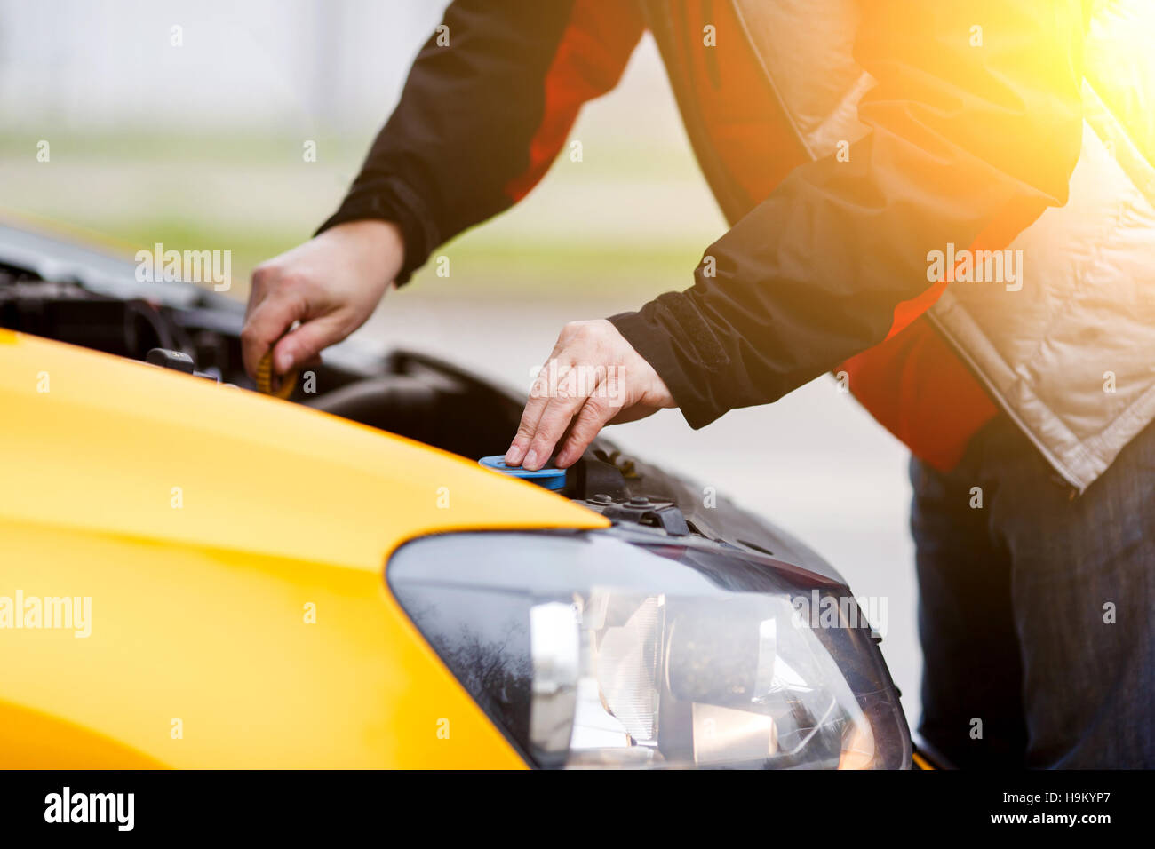Driver opened hood of cab Stock Photo - Alamy