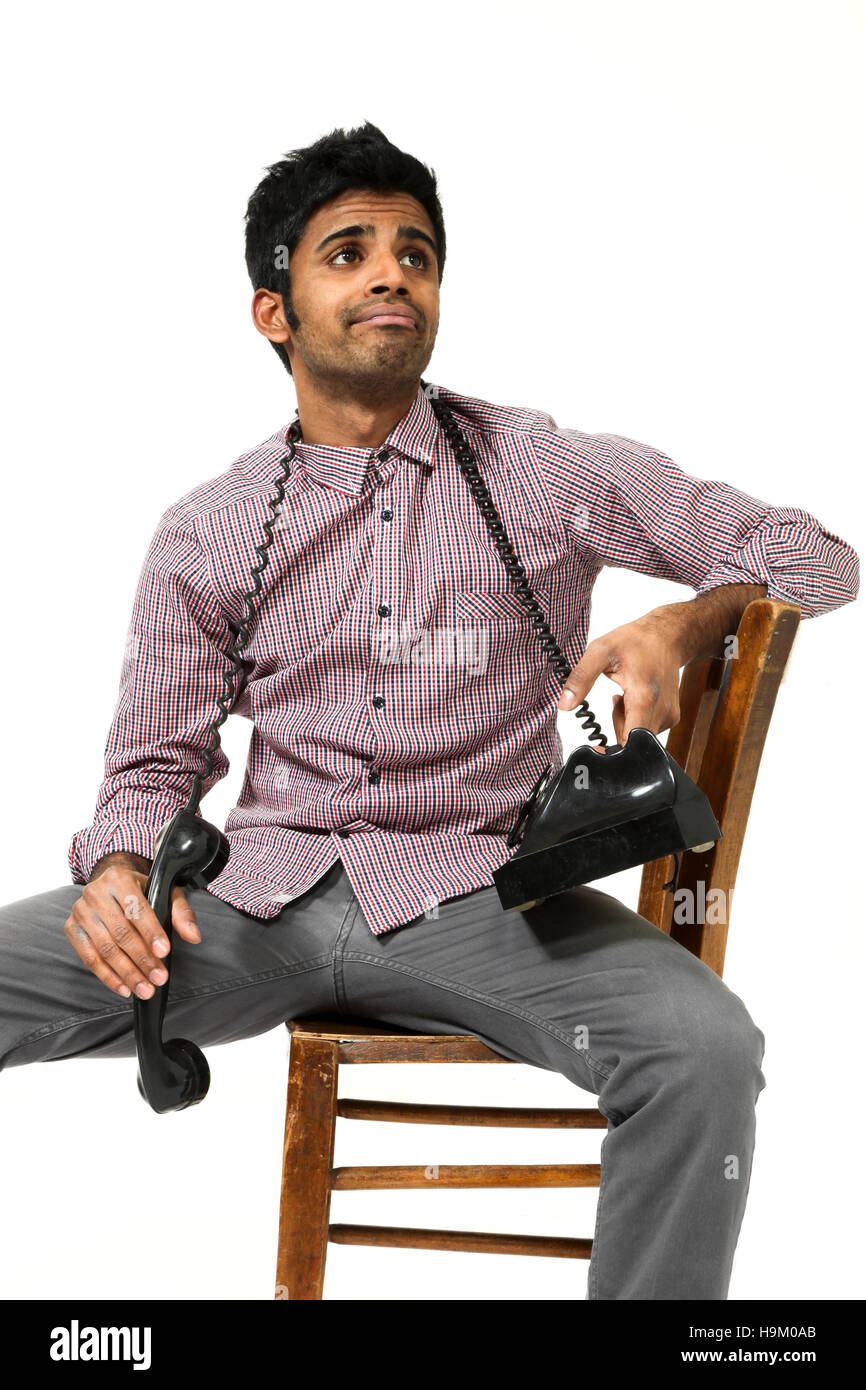 young man with a vintage telephone , portrait on white background Stock ...