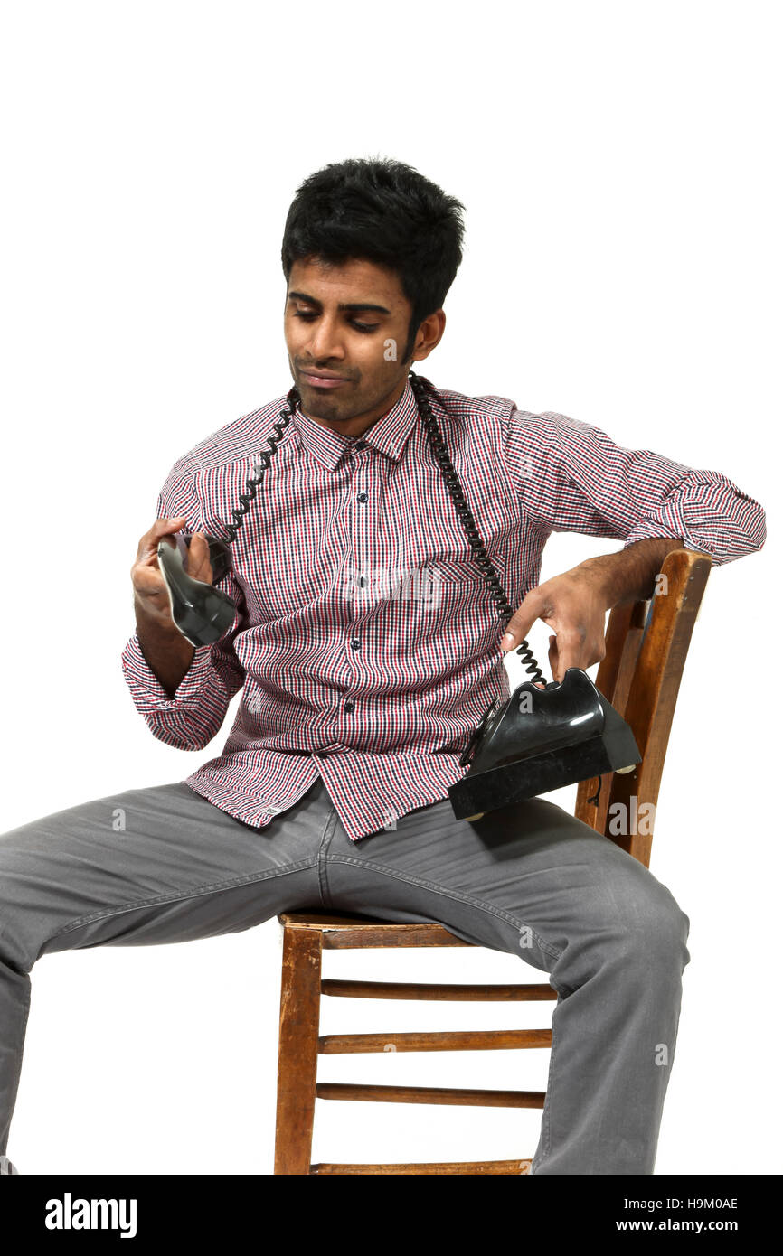 young man with a vintage telephone , portrait on white background Stock ...