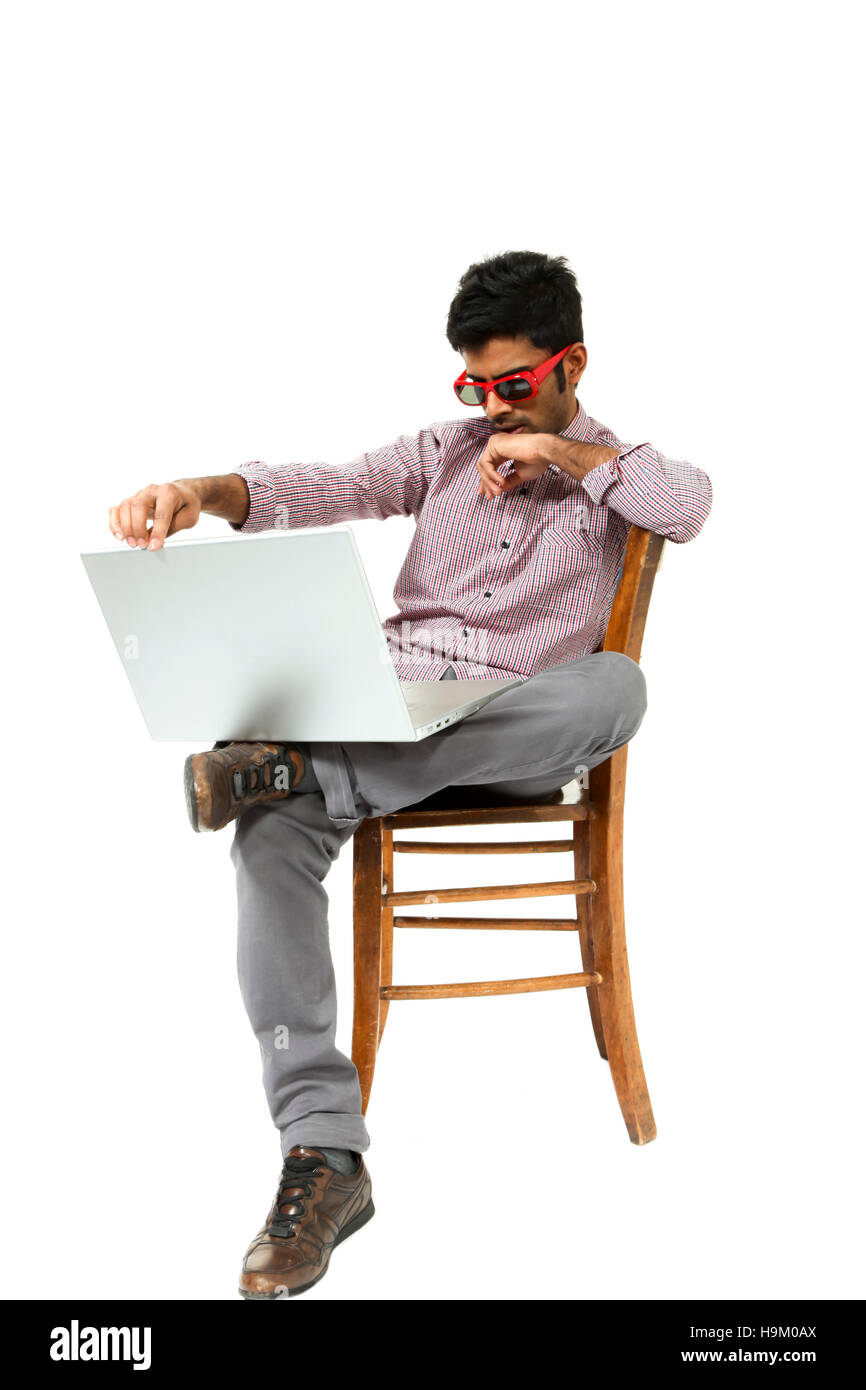portrait of young man with his laptop, over white background Stock ...