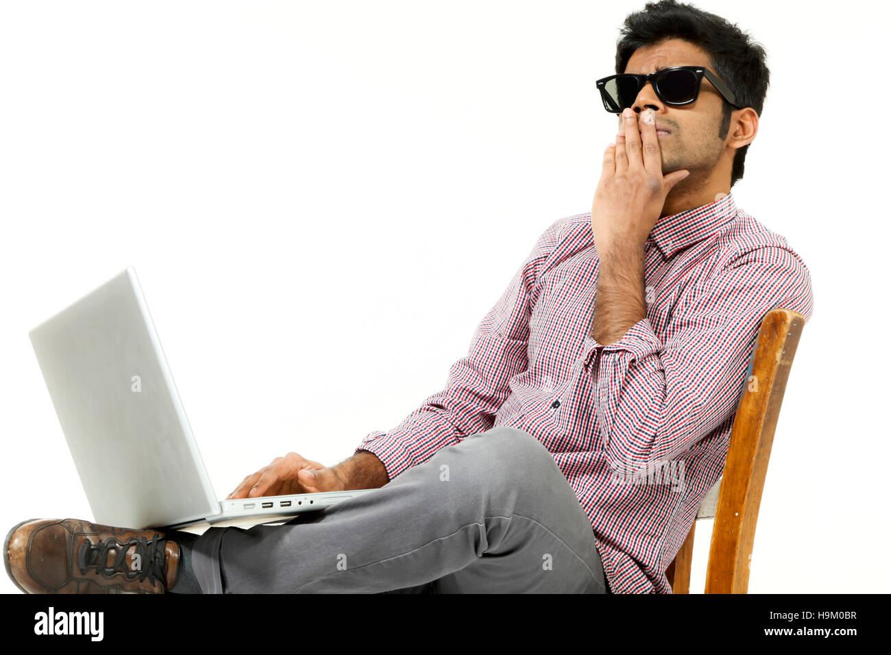 portrait of young man with his laptop Stock Photo - Alamy