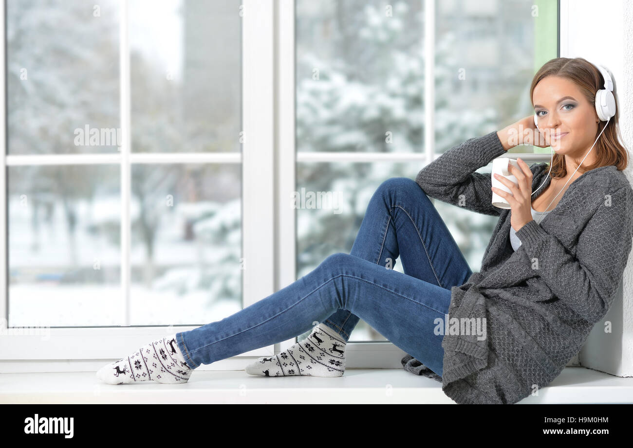 Girl drinking tea Stock Photo - Alamy