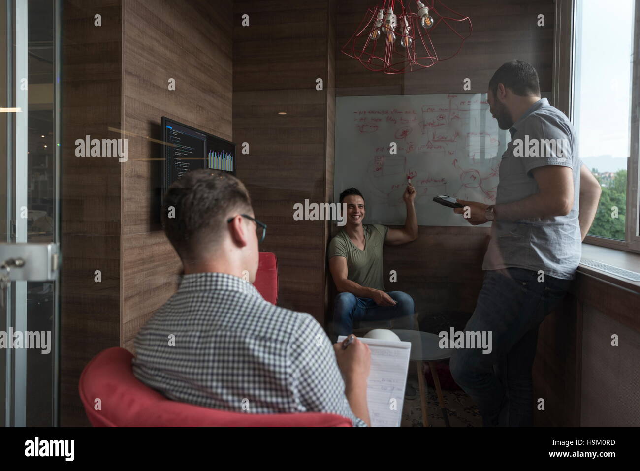 young people group in small private office have team meeting and ...