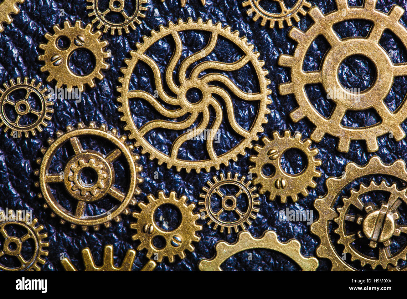 steampunk mechanical cogs gears wheels on leather background Stock ...