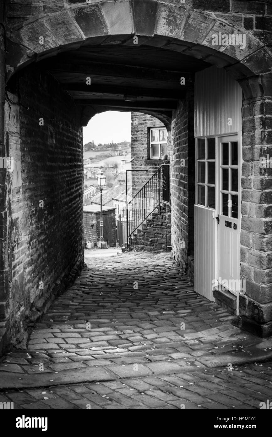 Side Alley off Main Street in Haworth, West Yorkshire Stock Photo - Alamy