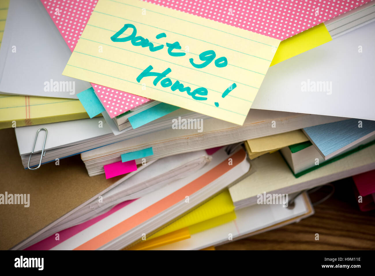 Don't Go Home; The Pile of Business Documents on the Desk Stock Photo ...