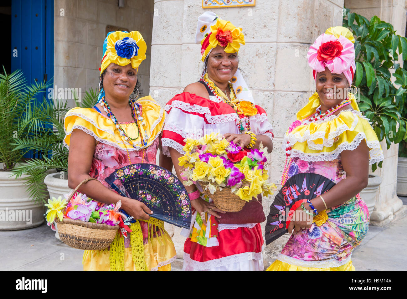 Cuban women with traditional clothing in old Havana Stock Photo - Alamy