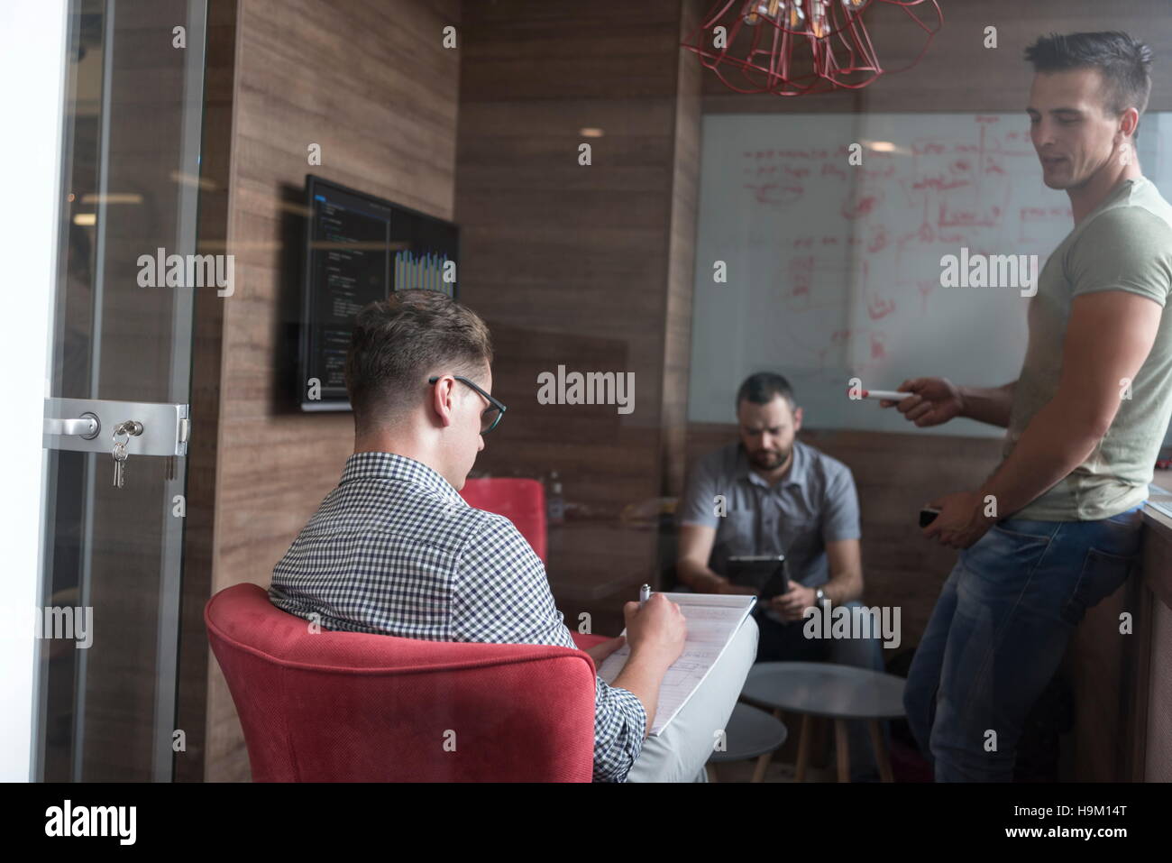 young people group in small private office have team meeting and ...