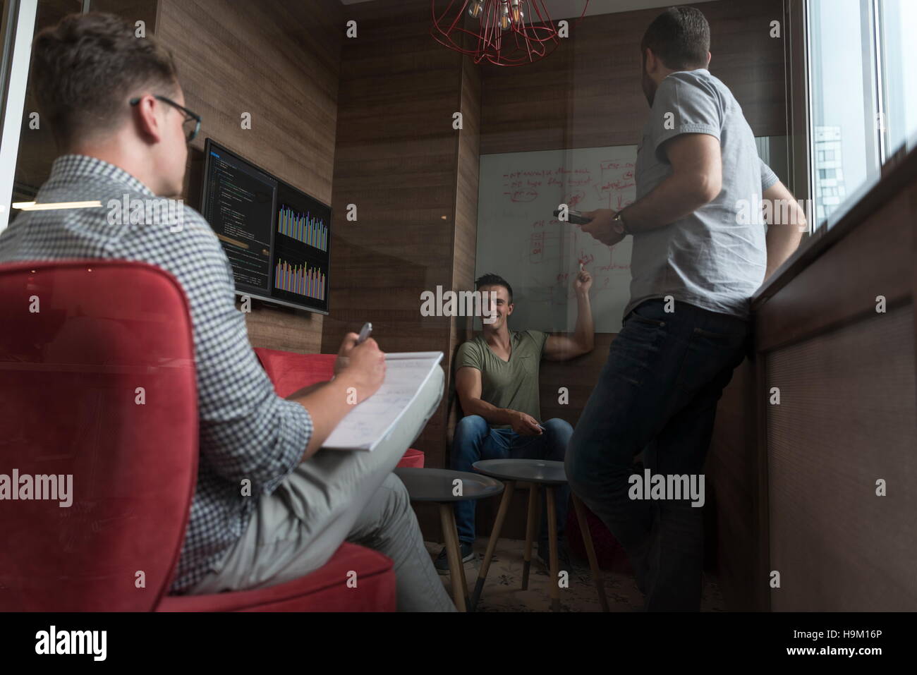 young people group in small private office have team meeting and ...