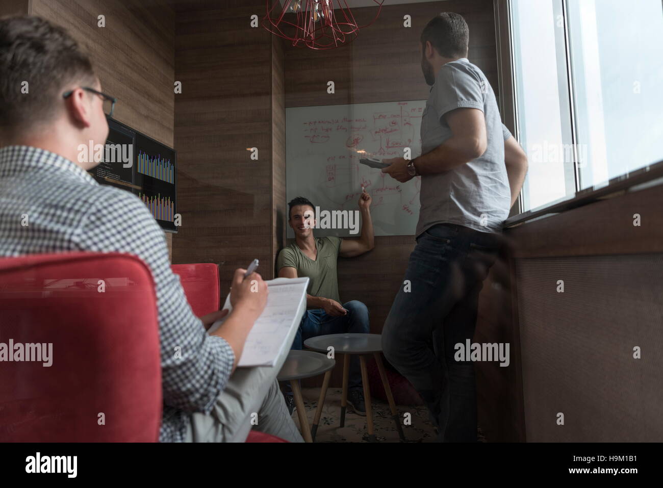 young people group in small private office have team meeting and ...