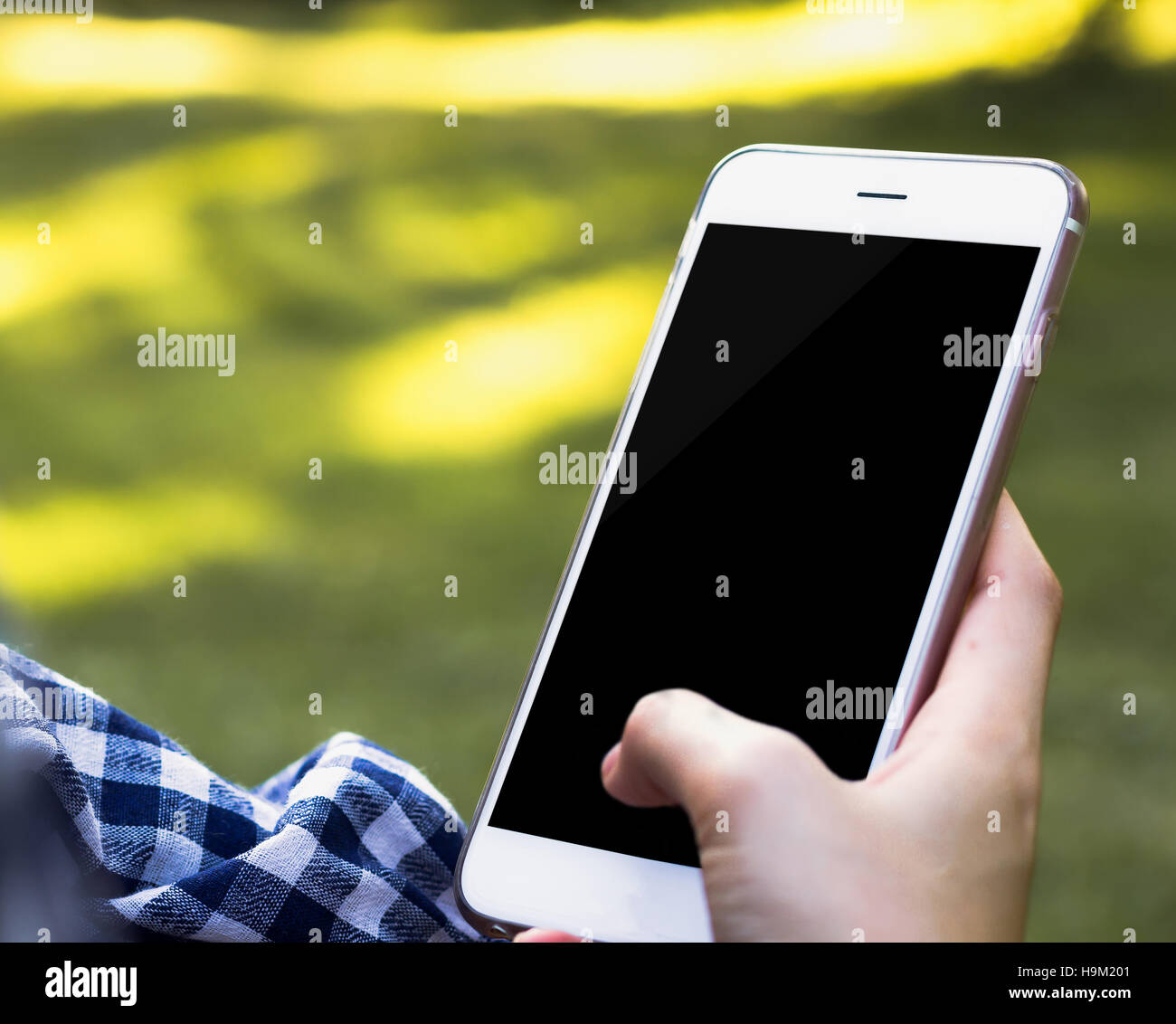 Person using mobile smartphone, in white color Stock Photo - Alamy
