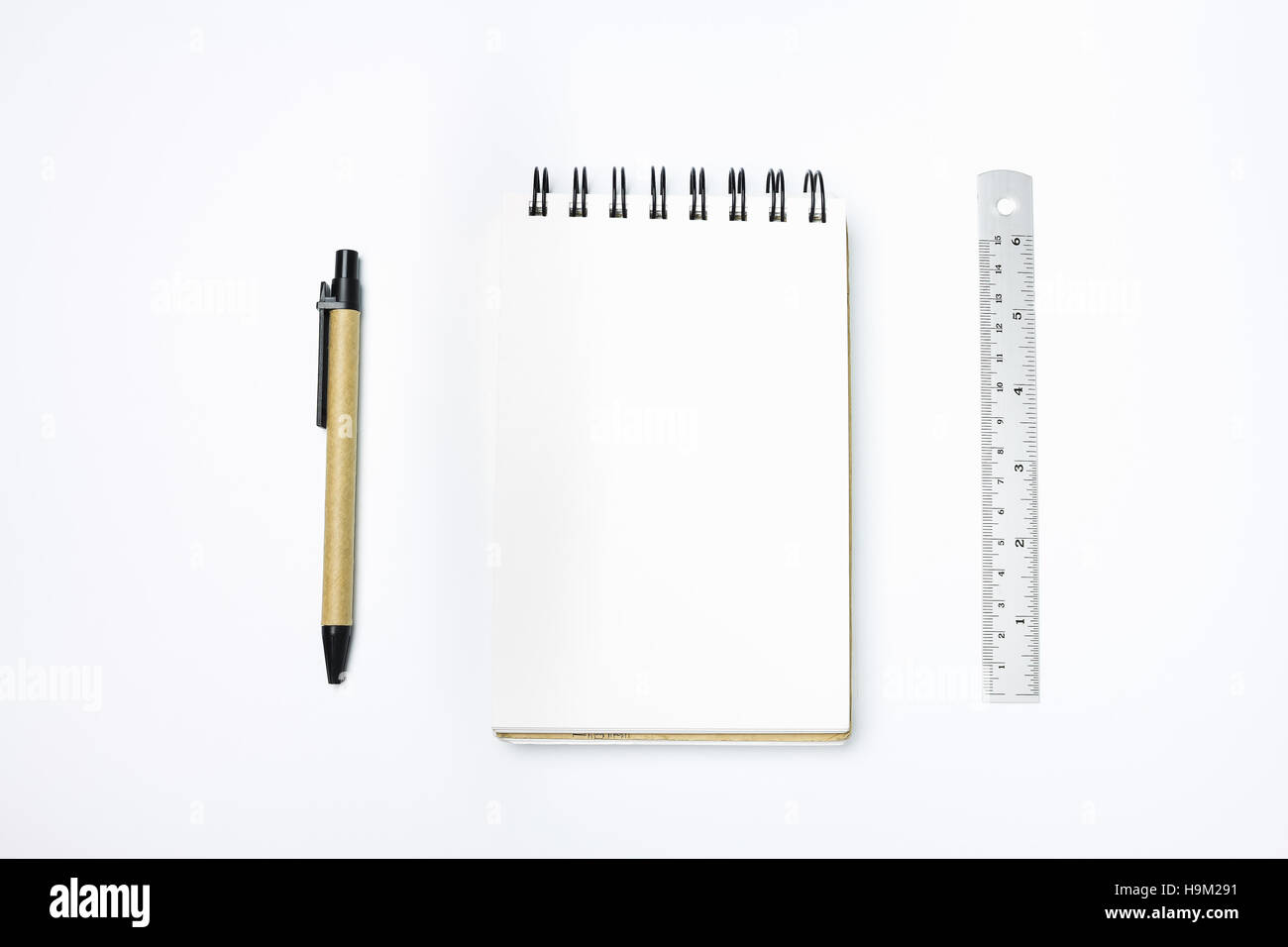 White designer office desk table with blank paper with pen, ruler. Top ...