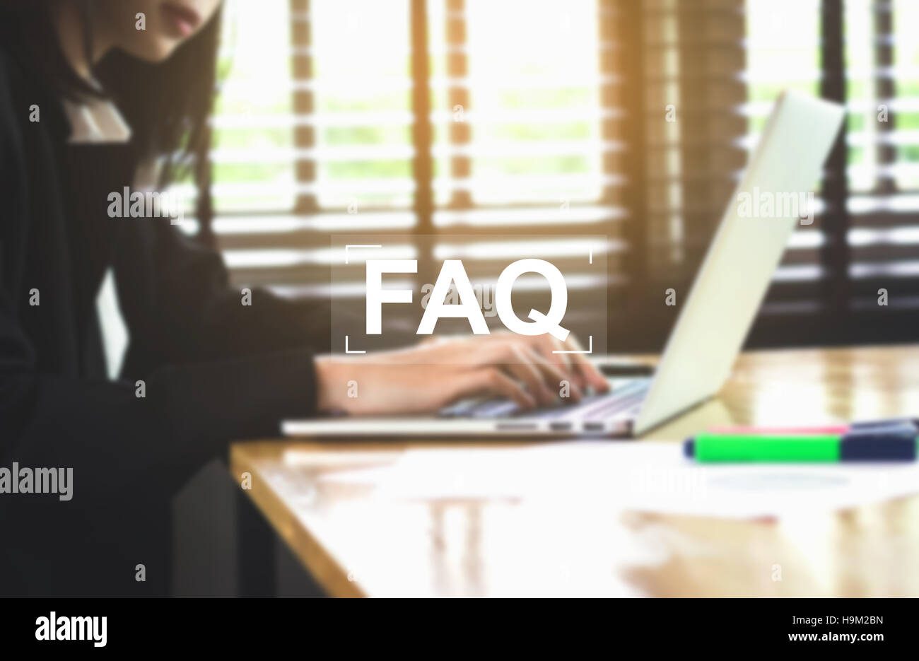 Concept FAQ message on background women working. Vintage tone Stock ...