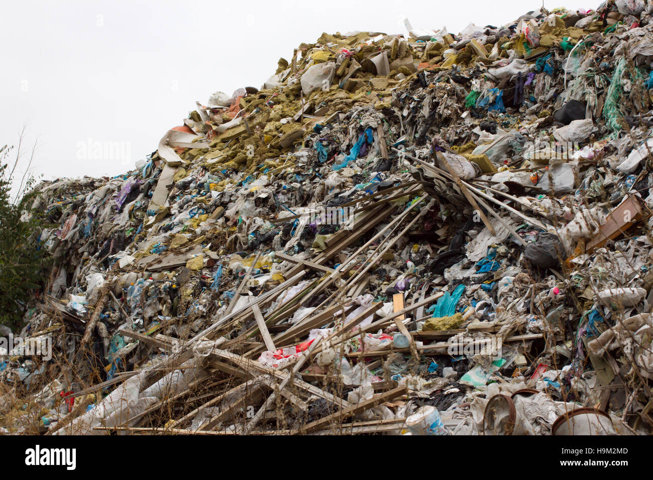 Landfill in Ukraine, piles of plastic dumped in piles. The roads along ...