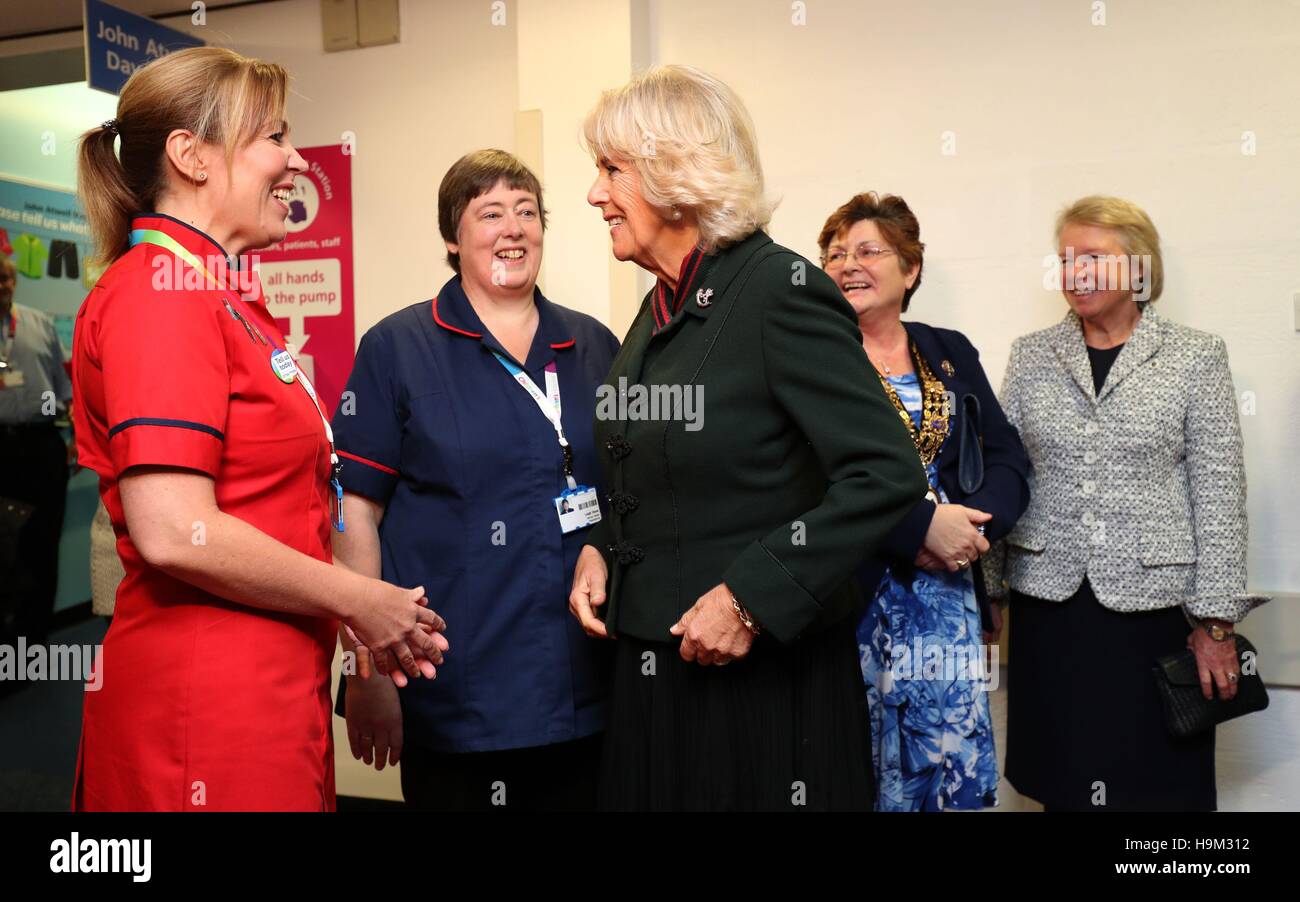 The Duchess of Cornwall (centre) meets staff during her visit to ...