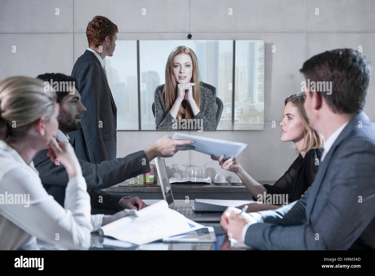 Staff in video conference Stock Photo - Alamy