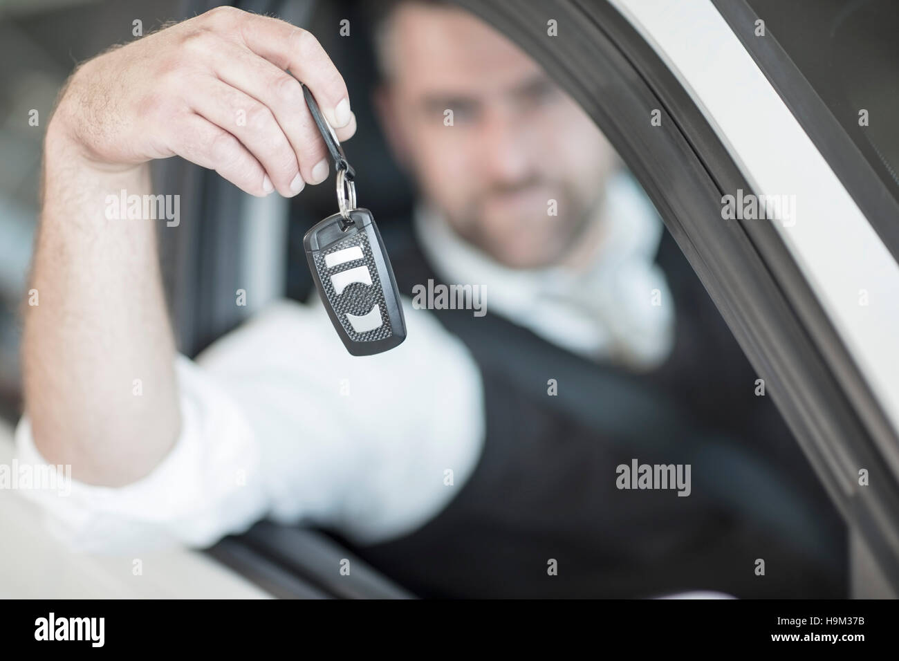 Man holding car keys Stock Photo - Alamy Man holding car keys Stock Photo - Alamy