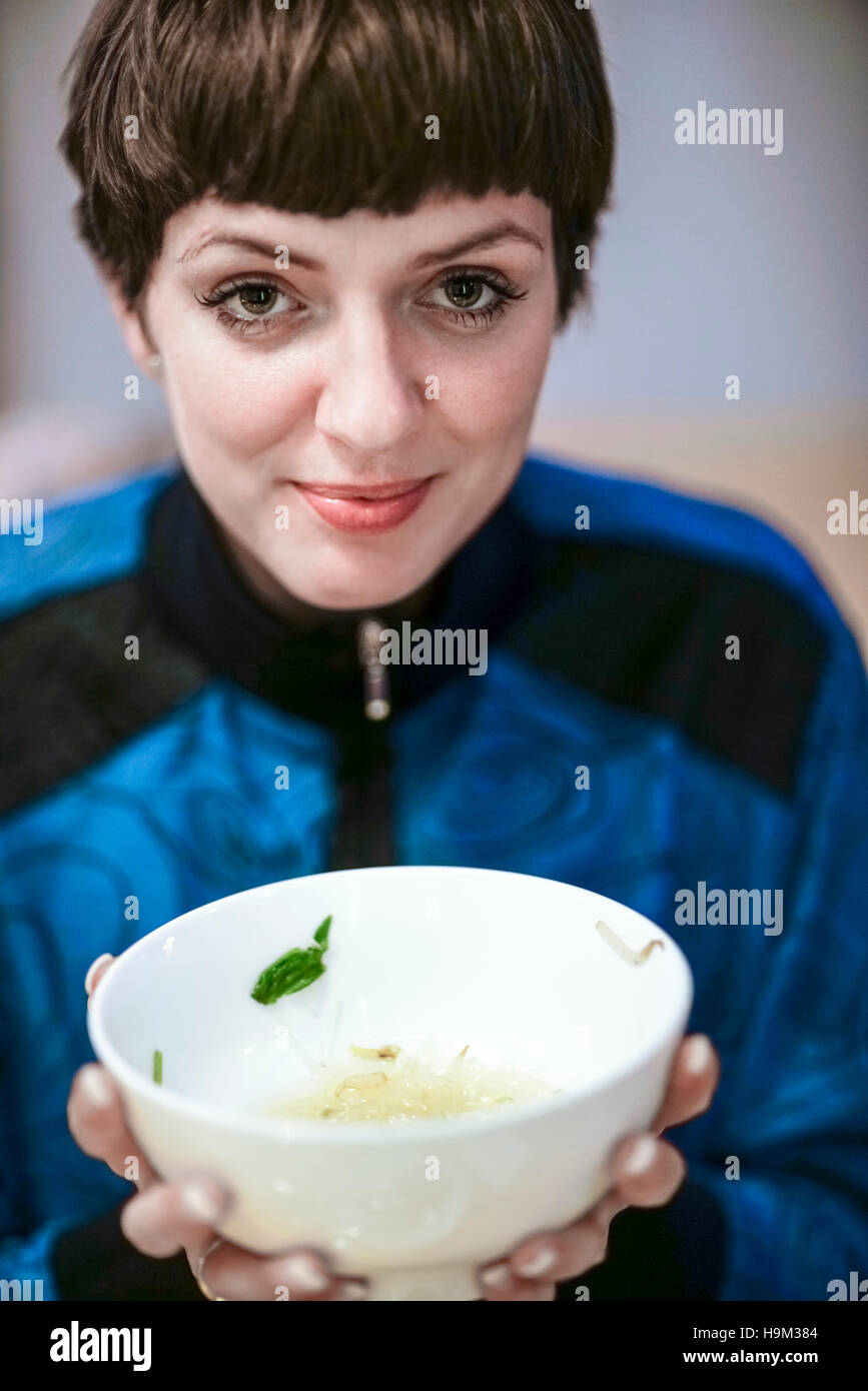 Young woman drinking soup hi-res stock photography and images - Alamy
