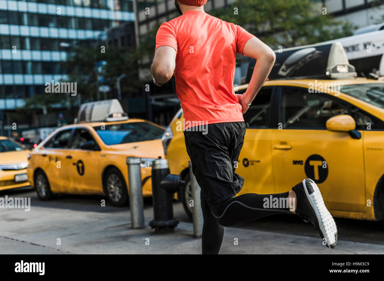 USA, New York City, man running in Manhattan Stock Photo - Alamy