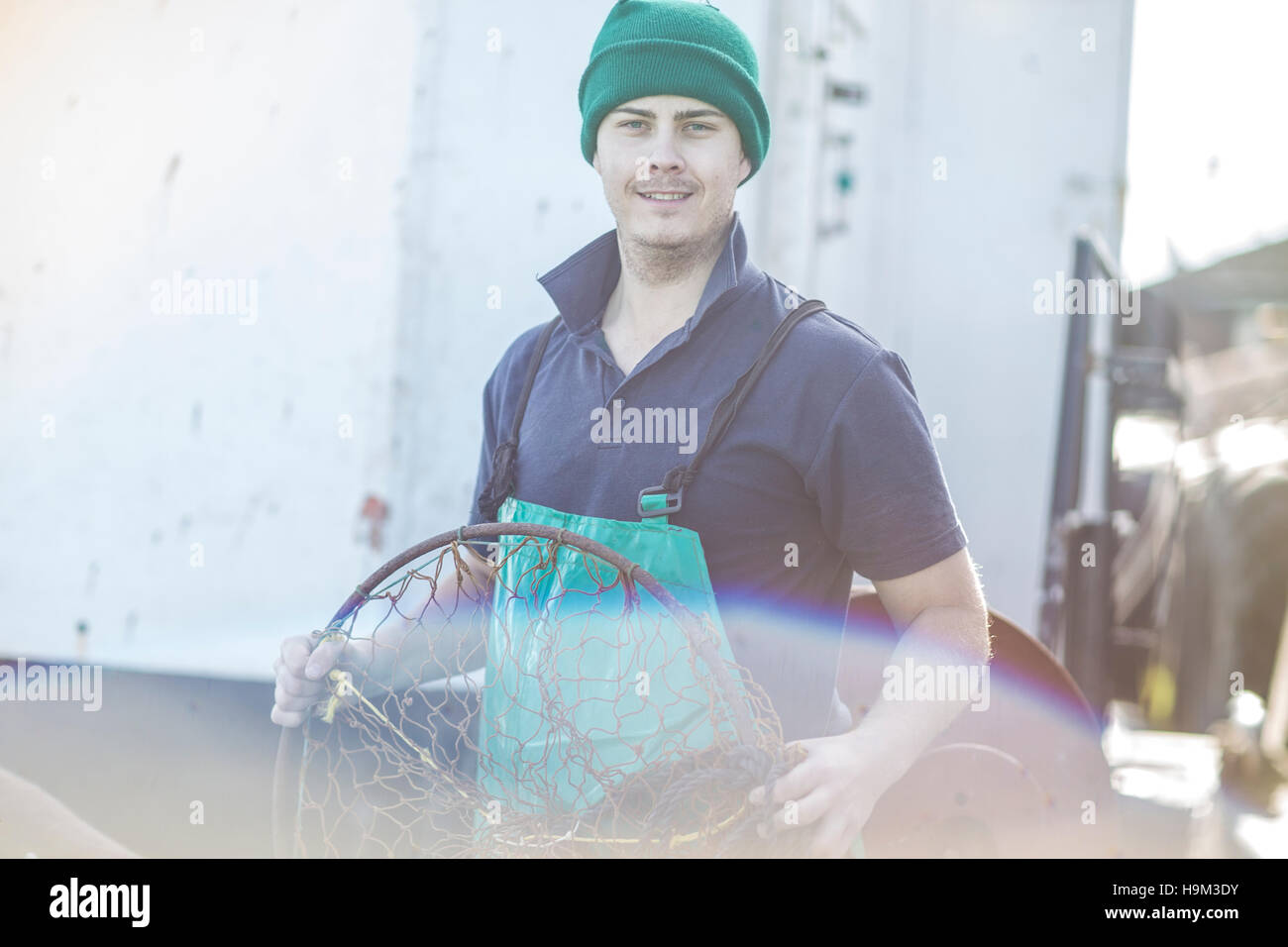 Fisherman working on trawler Stock Photo - Alamy