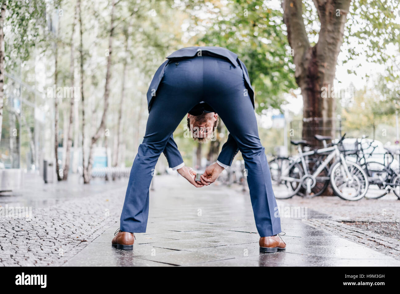 Bending over rear view hi-res stock photography and images - Alamy