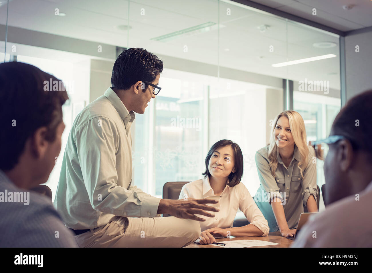 Business people in meeting having interesting discussion Stock Photo ...