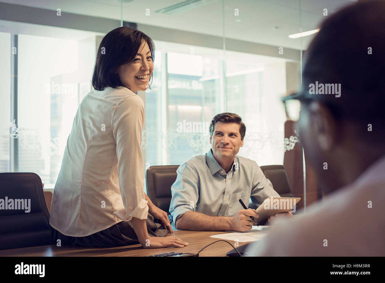 Business people in meeting having interesting discussion Stock Photo ...