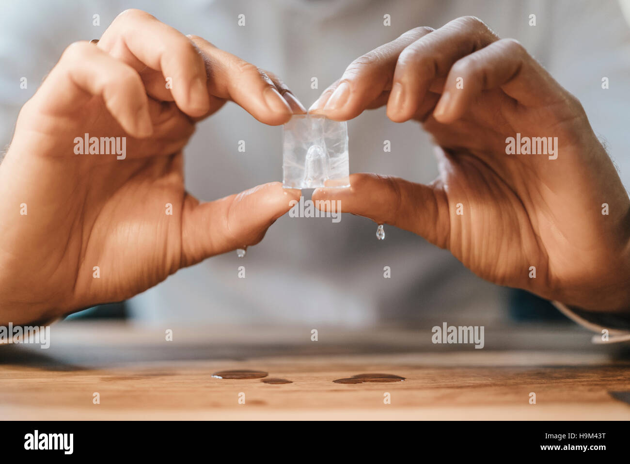 Melting Ice Cube Hand High Resolution Stock Photography and Images - Alamy