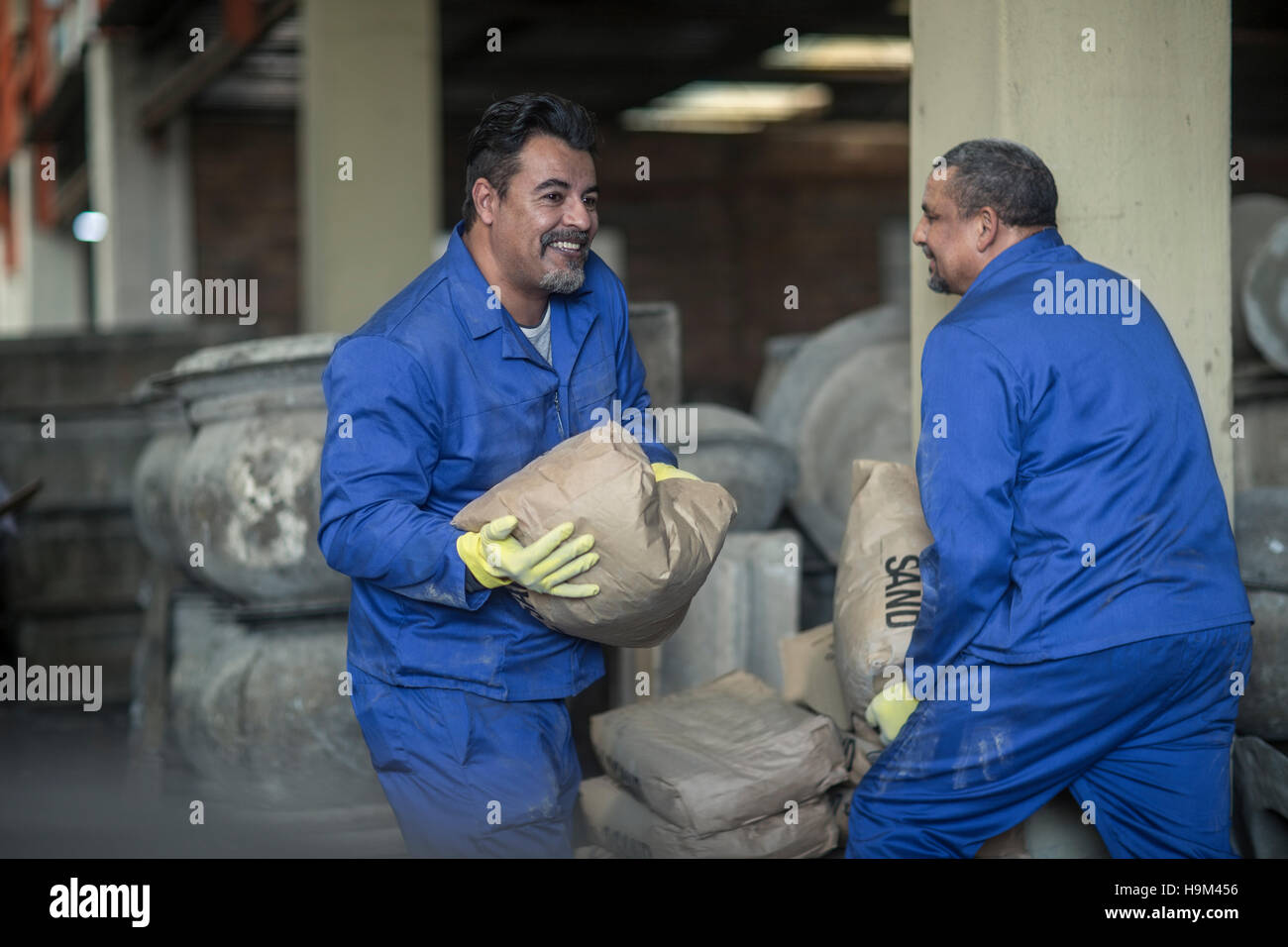 Carrying heavy pot hi-res stock photography and images - Alamy
