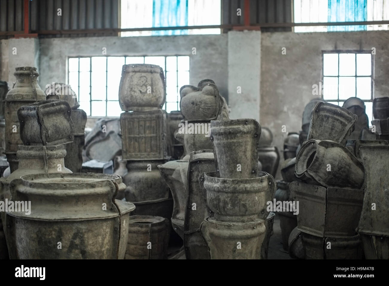 Molds in industrial pot factory Stock Photo - Alamy