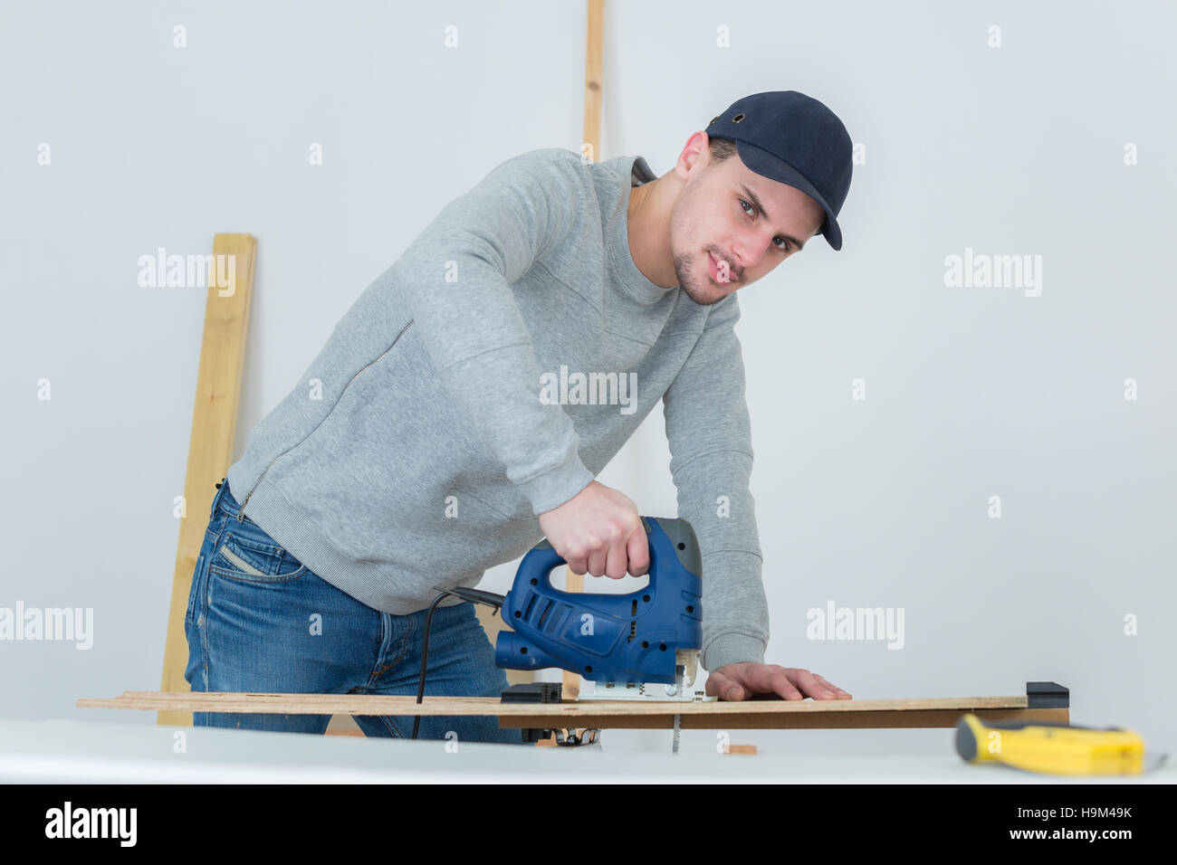 Manual jigsaw hi-res stock photography and images - Alamy