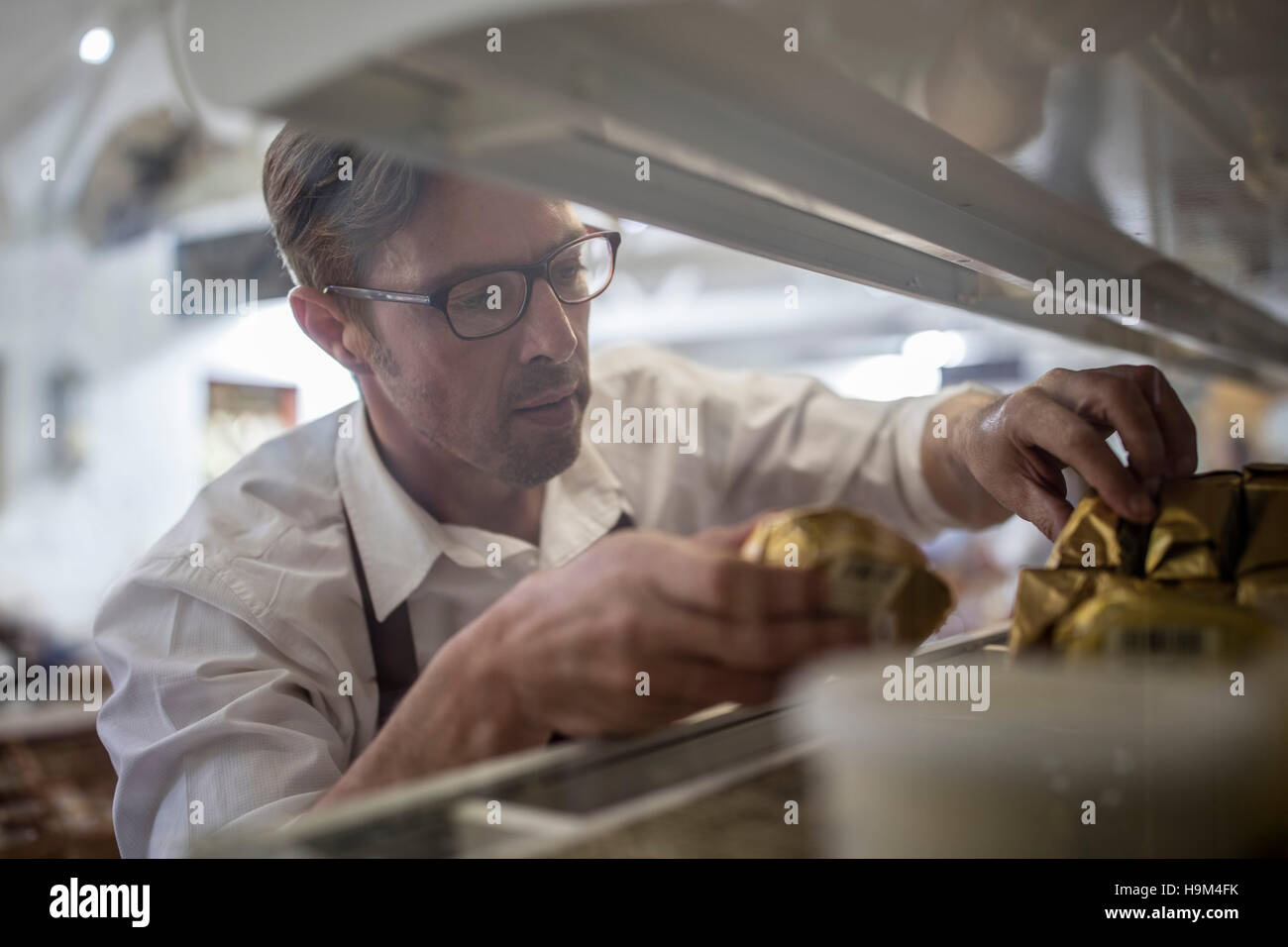 Grocer at work Stock Photo - Alamy