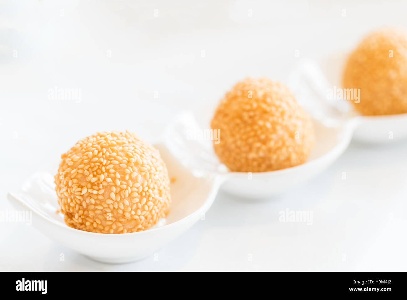 Chinese dim sum Fried sesame balls stuff with custard lava - Chinese ...