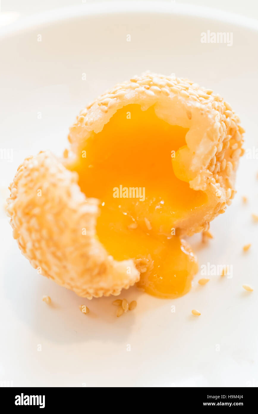 Chinese dim sum Fried sesame balls stuff with custard lava - Chinese ...