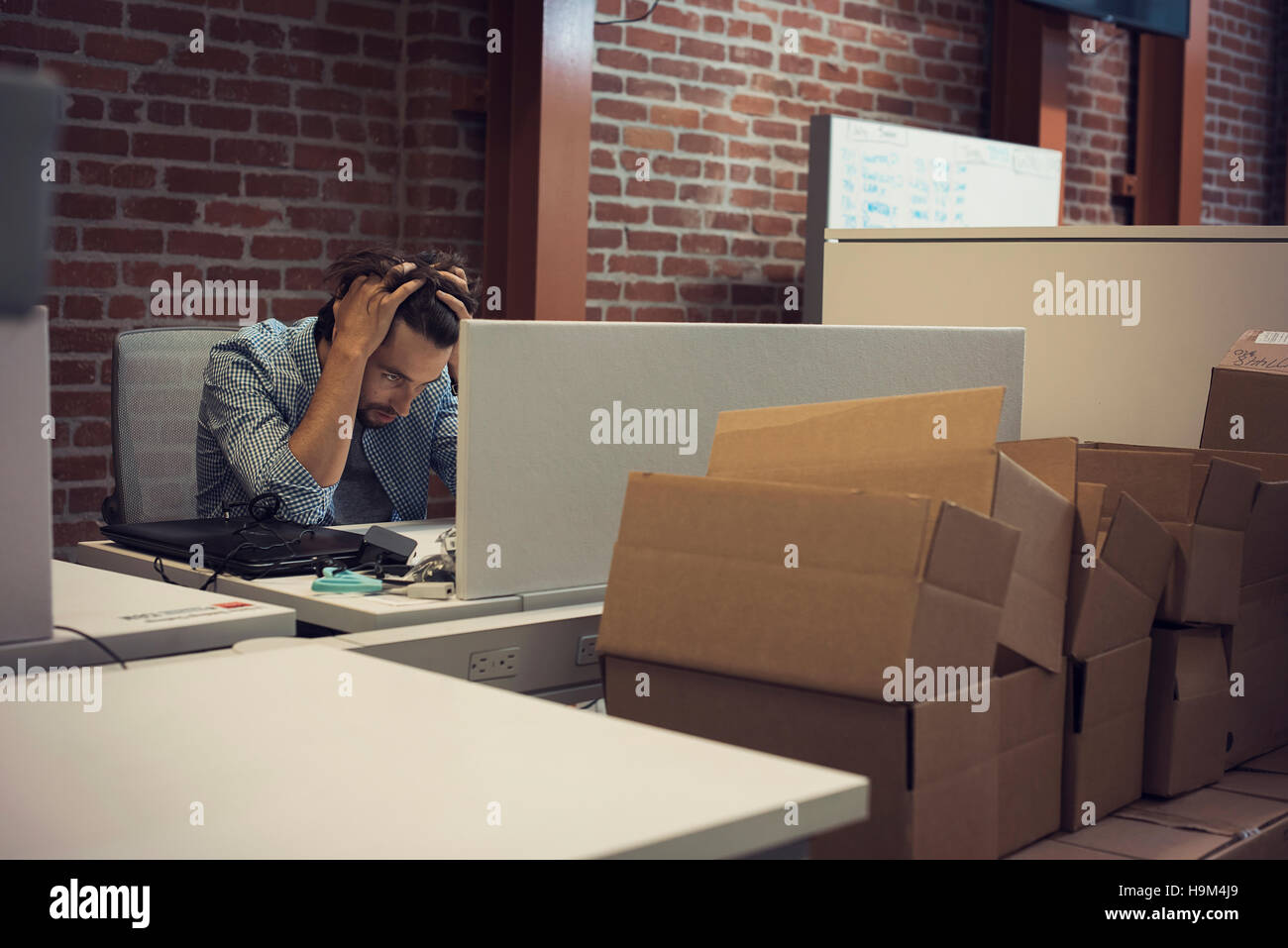 desperate businessman working in office Stock Photo - Alamy