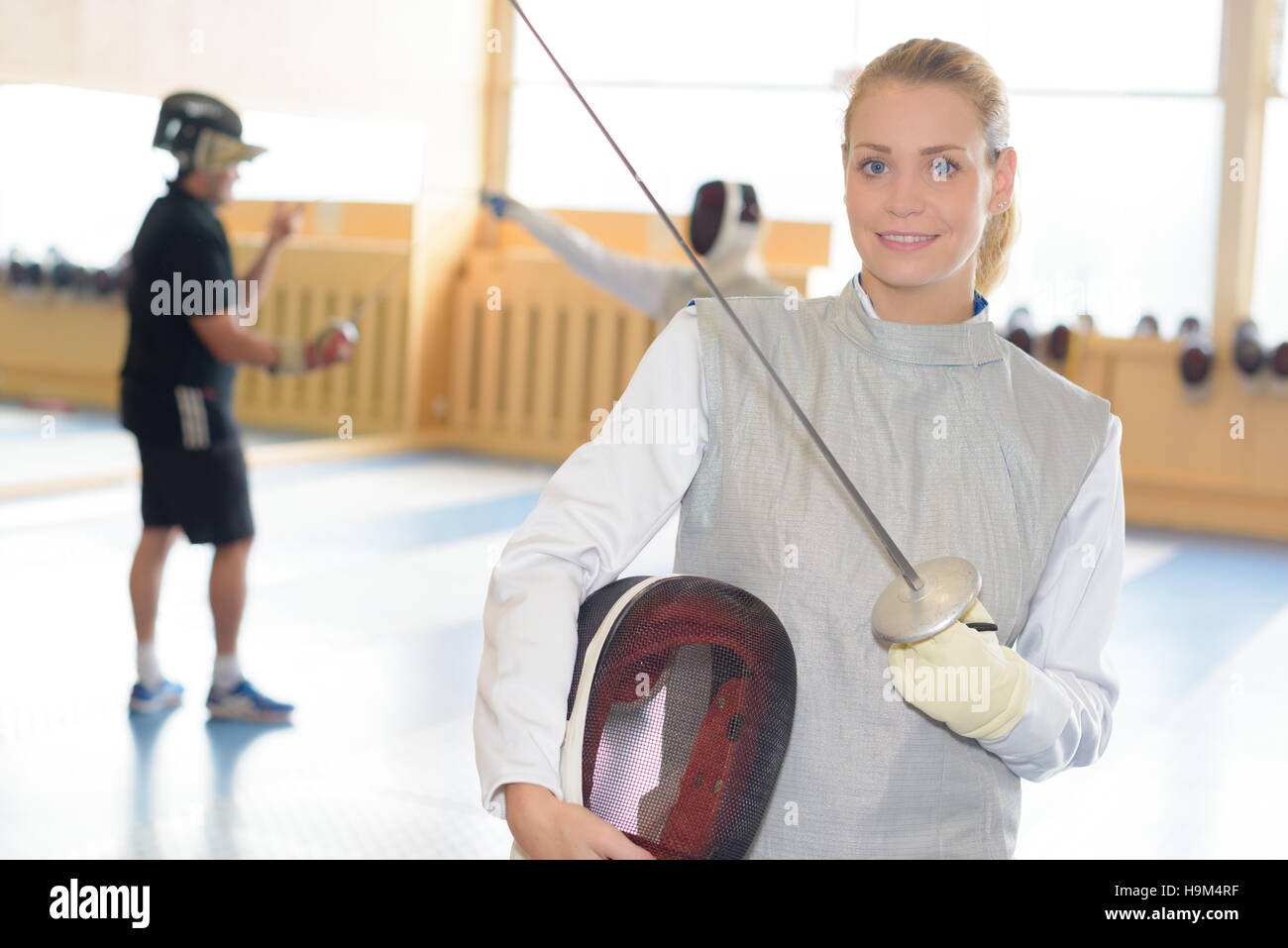 Woman fencing hi-res stock photography and images - Alamy