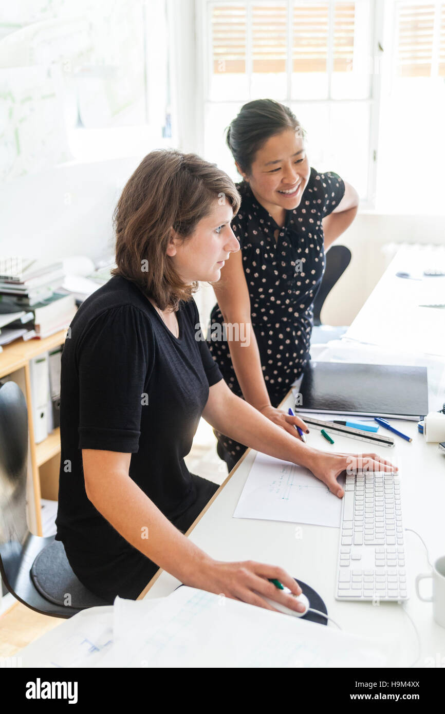 Two landscape architects at work in the office Stock Photo - Alamy