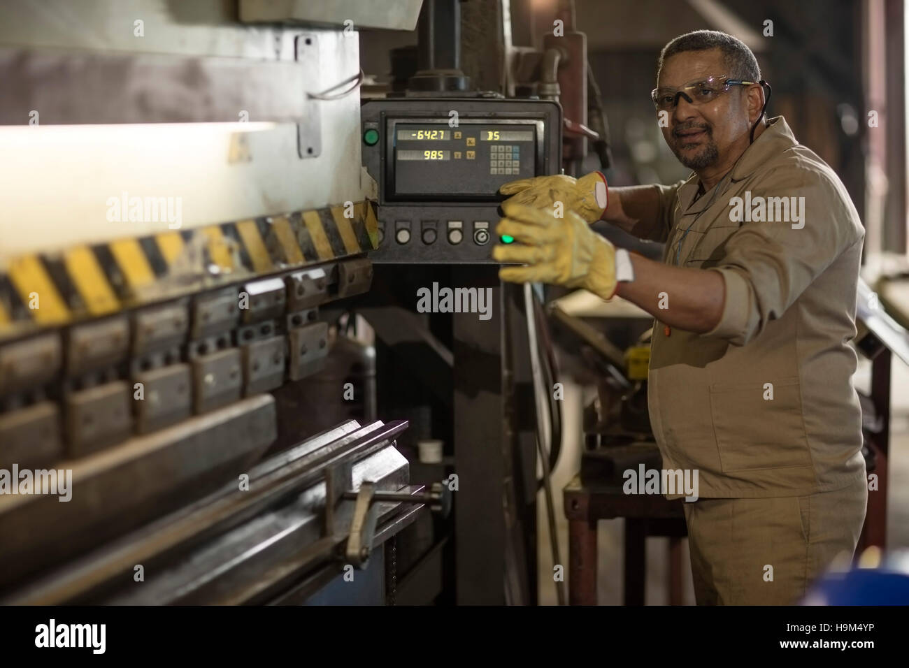 Engineer working at power plant Stock Photo - Alamy