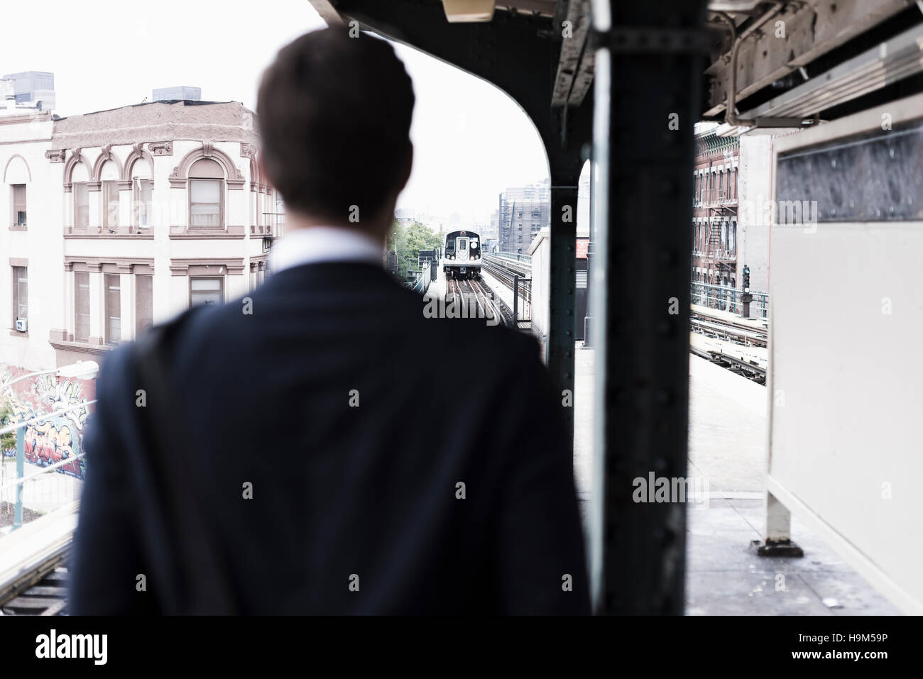 Man watching metro train hi-res stock photography and images - Alamy