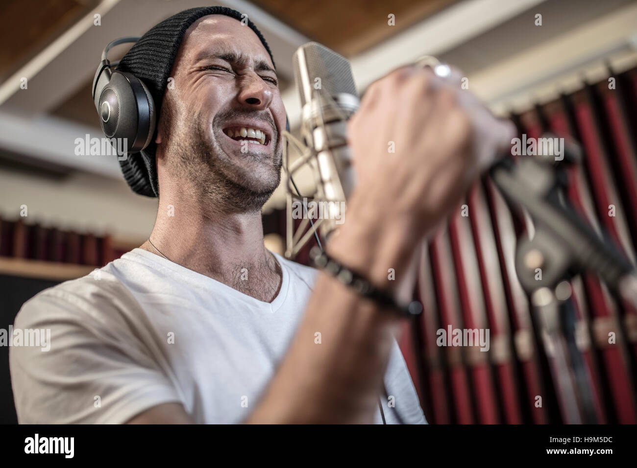 Singer at recording studio Stock Photo - Alamy